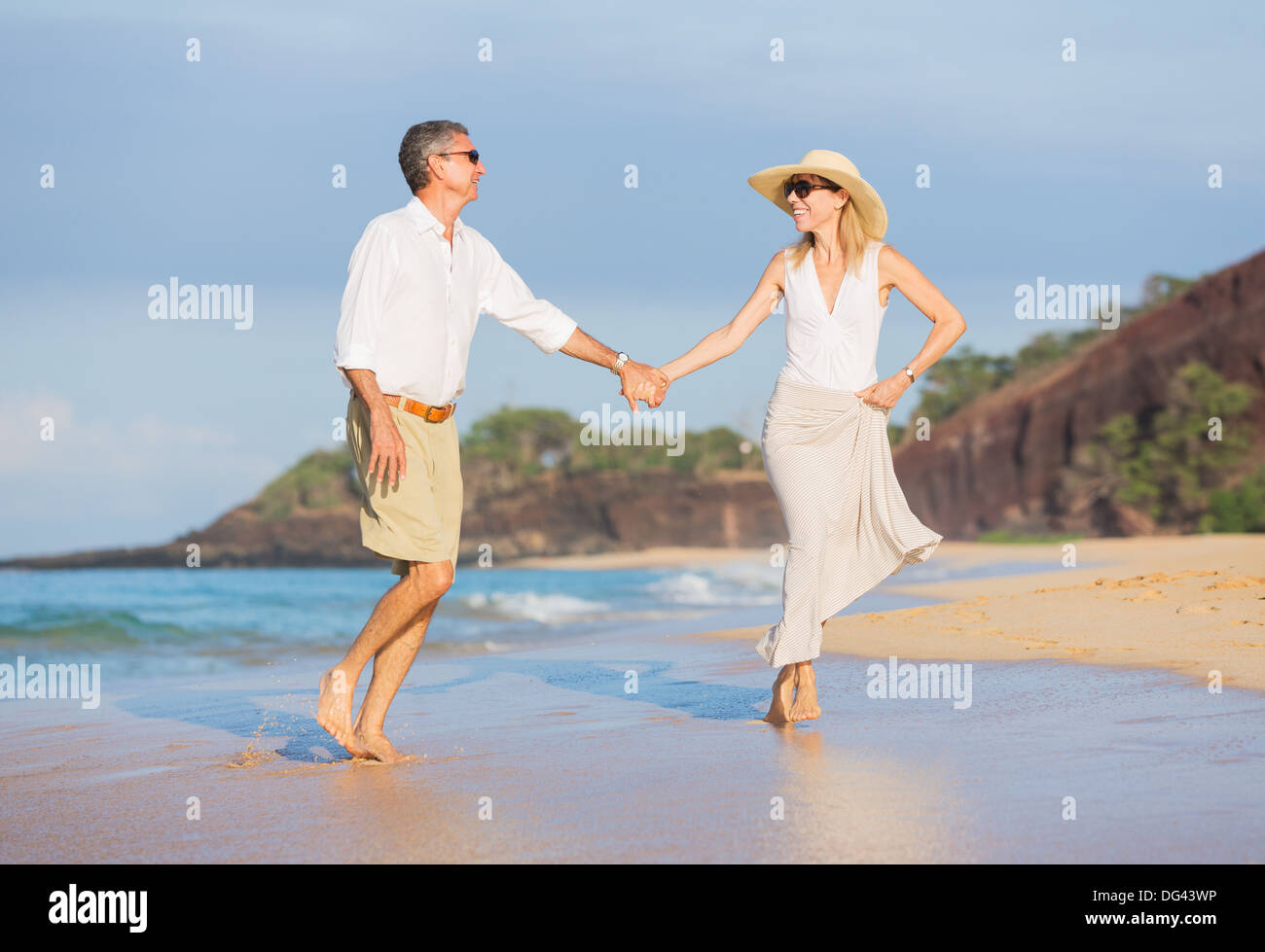 Happy Romantic Middle Aged Couple Enjoying Walk on the Beach, Vacation ...