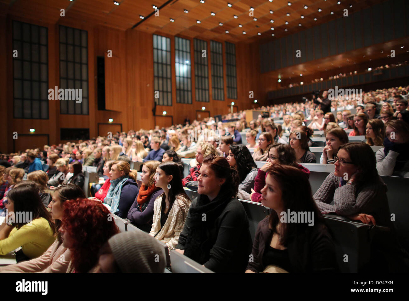 Cologne, Germany. 14th Oct, 2013. Students attend a lecture at the ...