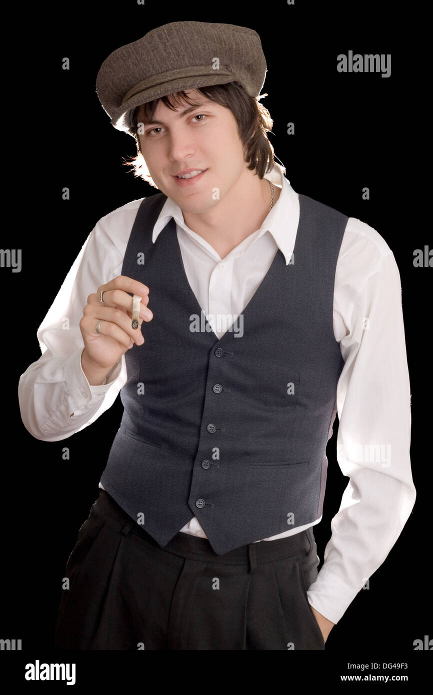 Young man malicious smile holding hi-res stock photography and images ...