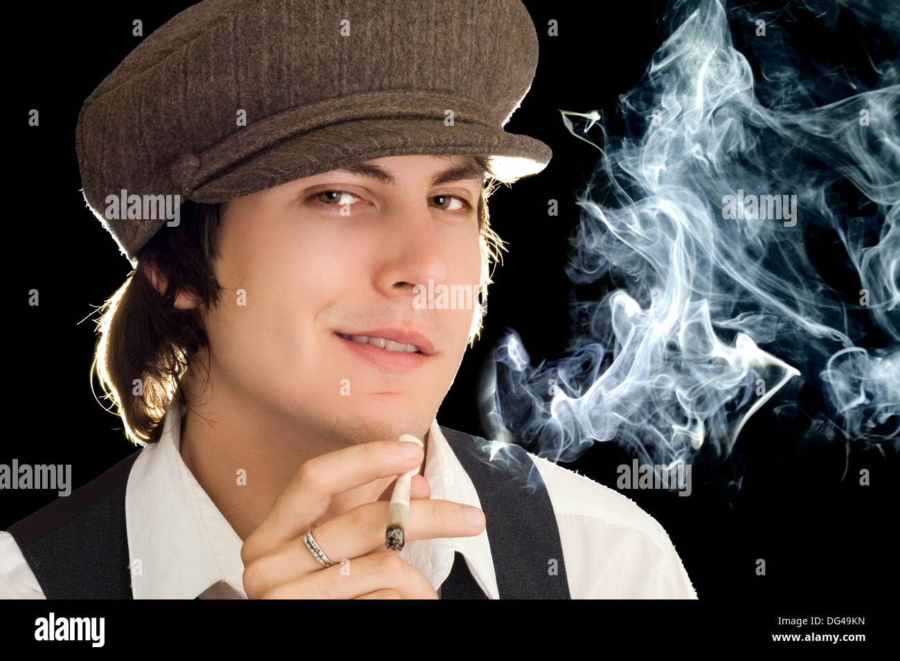 Man smoking cigarette straight on suit hi-res stock photography and ...