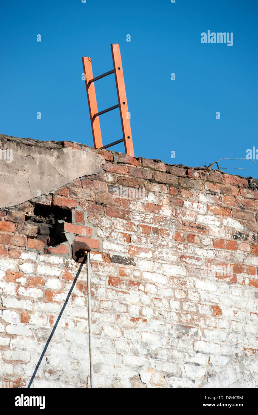 Ladder wall overcome climb over sky obstacle Stock Photo - Alamy