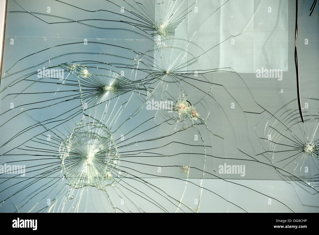 Broken smashed laminated bus windscreen glass Stock Photo - Alamy