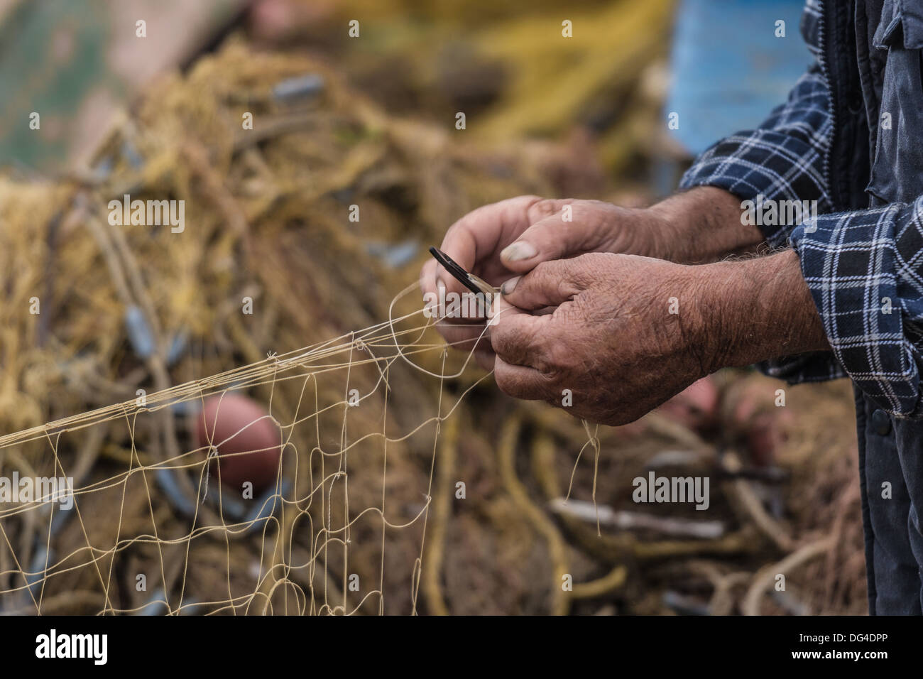 Old hands, Dexterity, mending nets, fishing net, repairing nets Stock ...