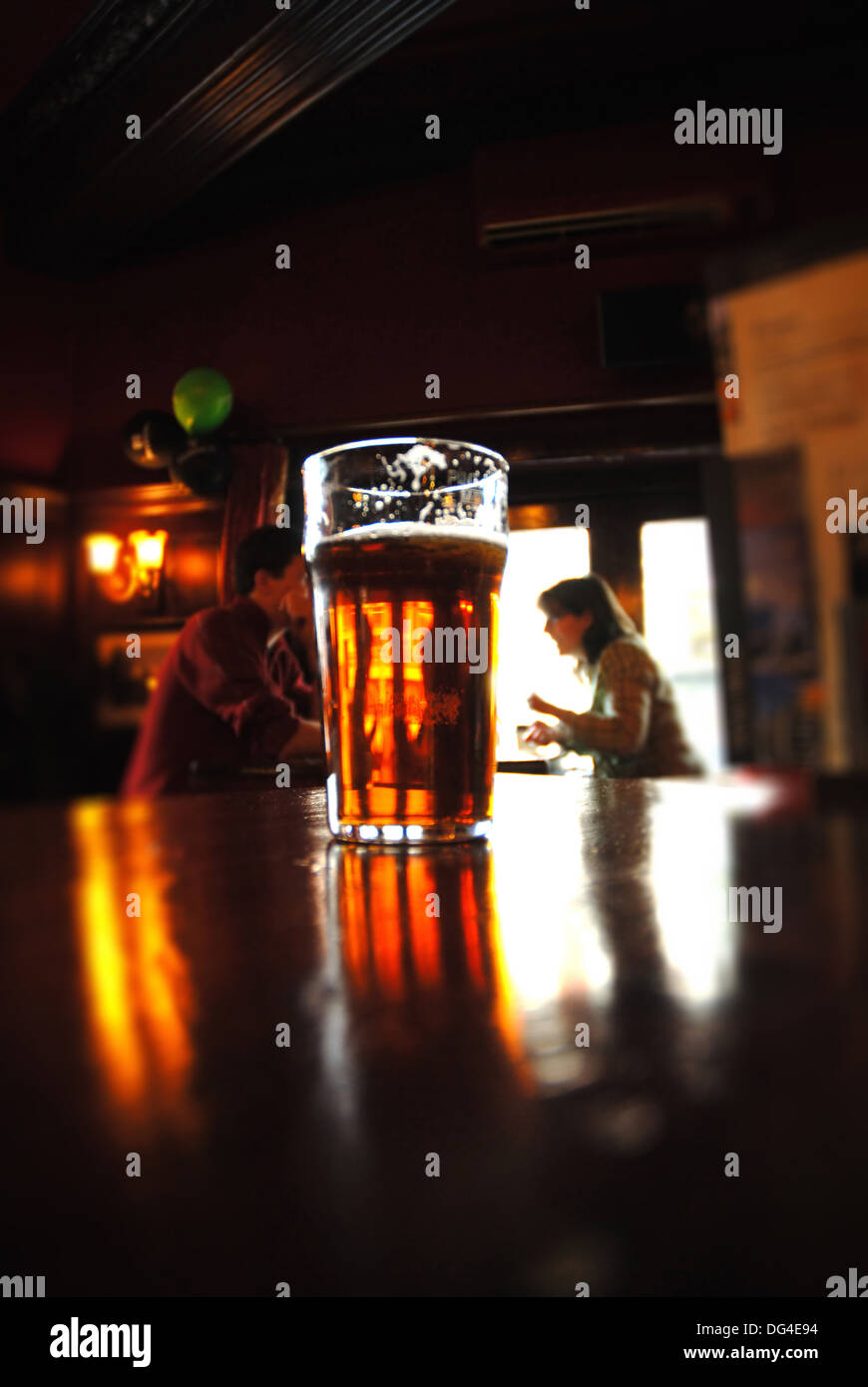 Beer drinkers at the bar hi-res stock photography and images - Alamy