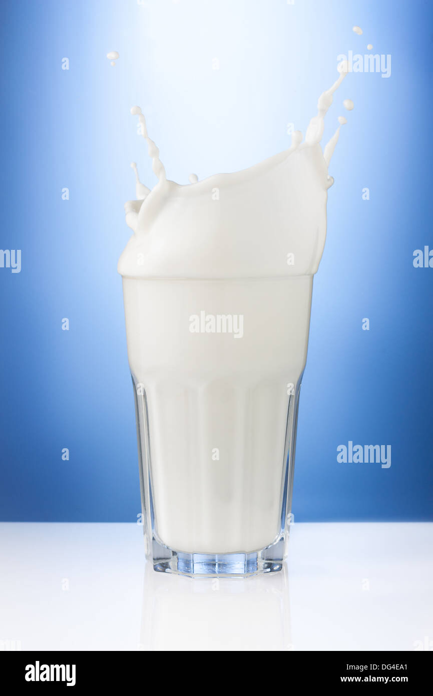 Milk splash in cup hi-res stock photography and images - Alamy