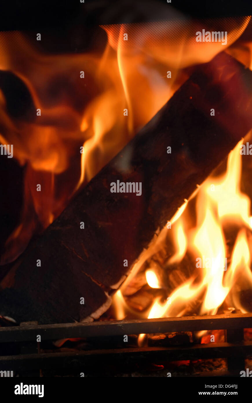 Flames in fire grate Stock Photo - Alamy