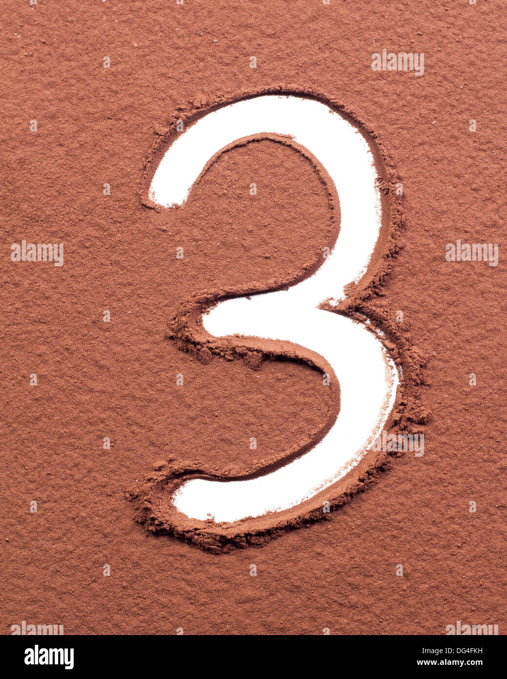 Number 3 made of cocoa powder on white background Stock Photo - Alamy