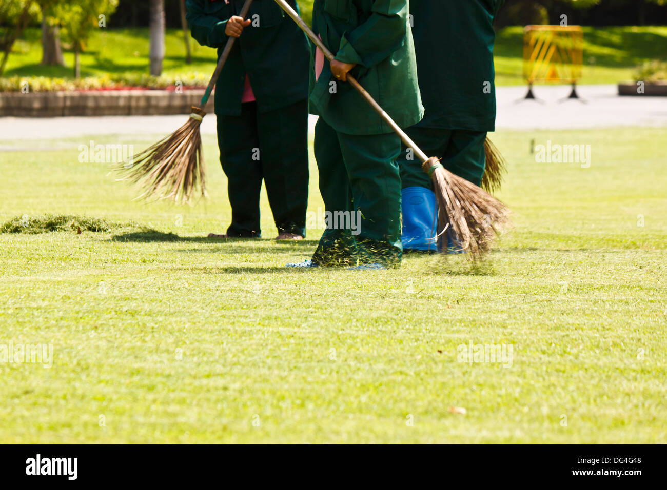 gardener clean garden Stock Photo - Alamy