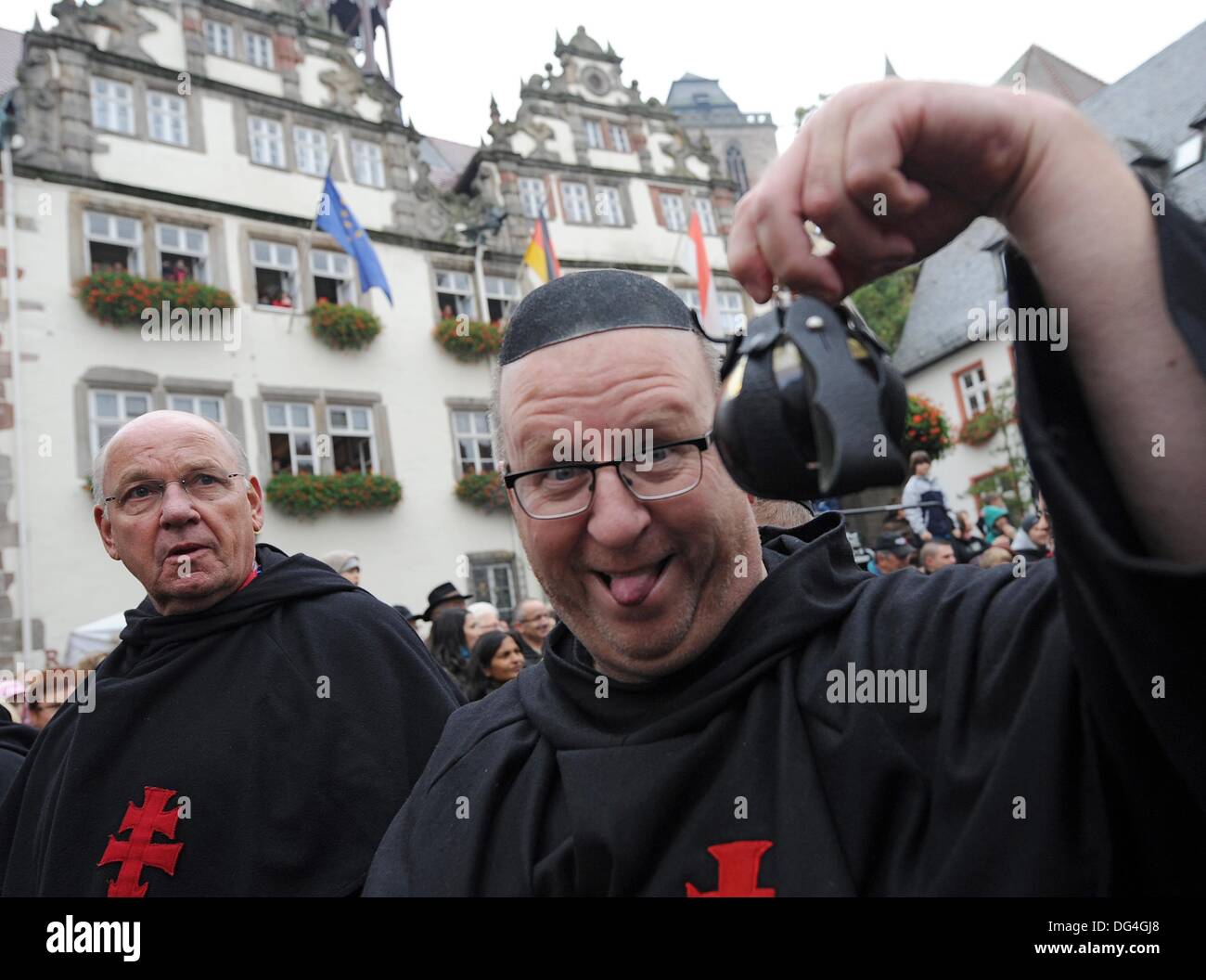Bad Hersfeld, Germany. 14th Oct, 2013. Two men who are dressed as monks ...