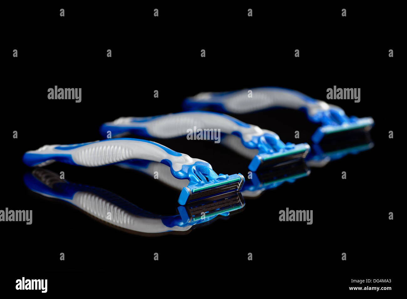 Three Disposable Razors on Black Background Stock Photo - Alamy