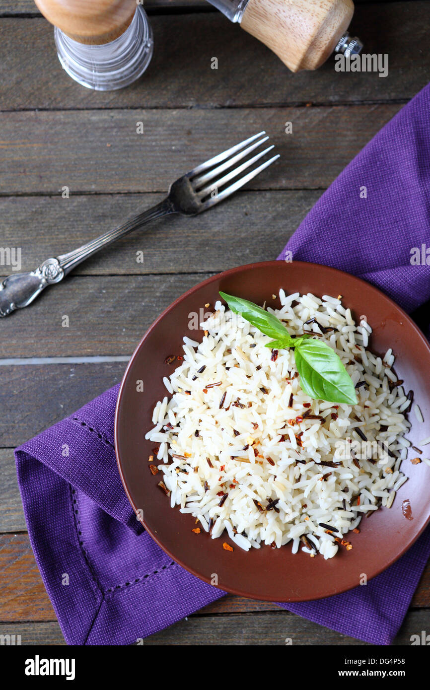 Boiled long grain rice on a ceramic plate, top view Stock Photo - Alamy