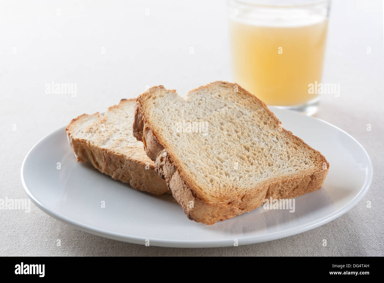 two toast plate with fruit juice Stock Photo - Alamy