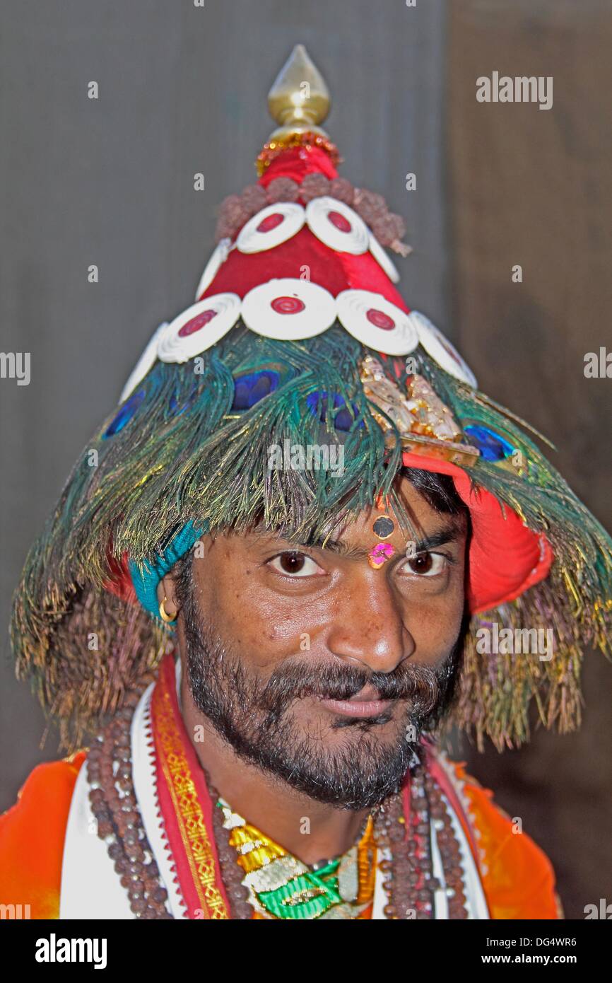 Peacock feather cap hi-res stock photography and images - Alamy