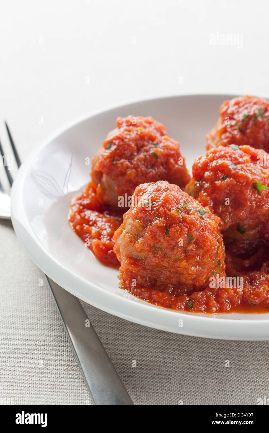 Plate of meatballs with tomato sauce Stock Photo - Alamy