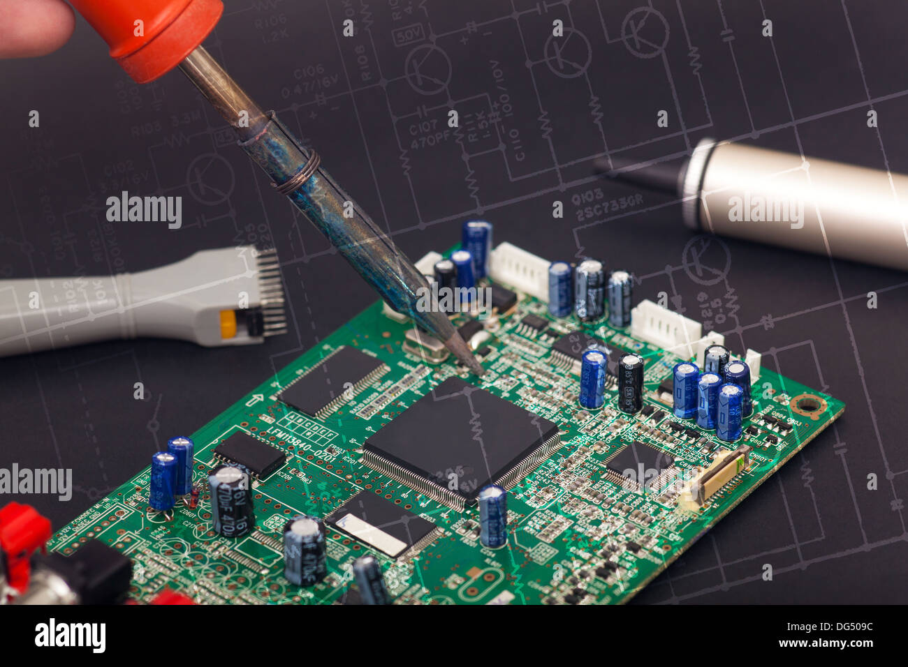 Electronic reparation in black background Stock Photo - Alamy