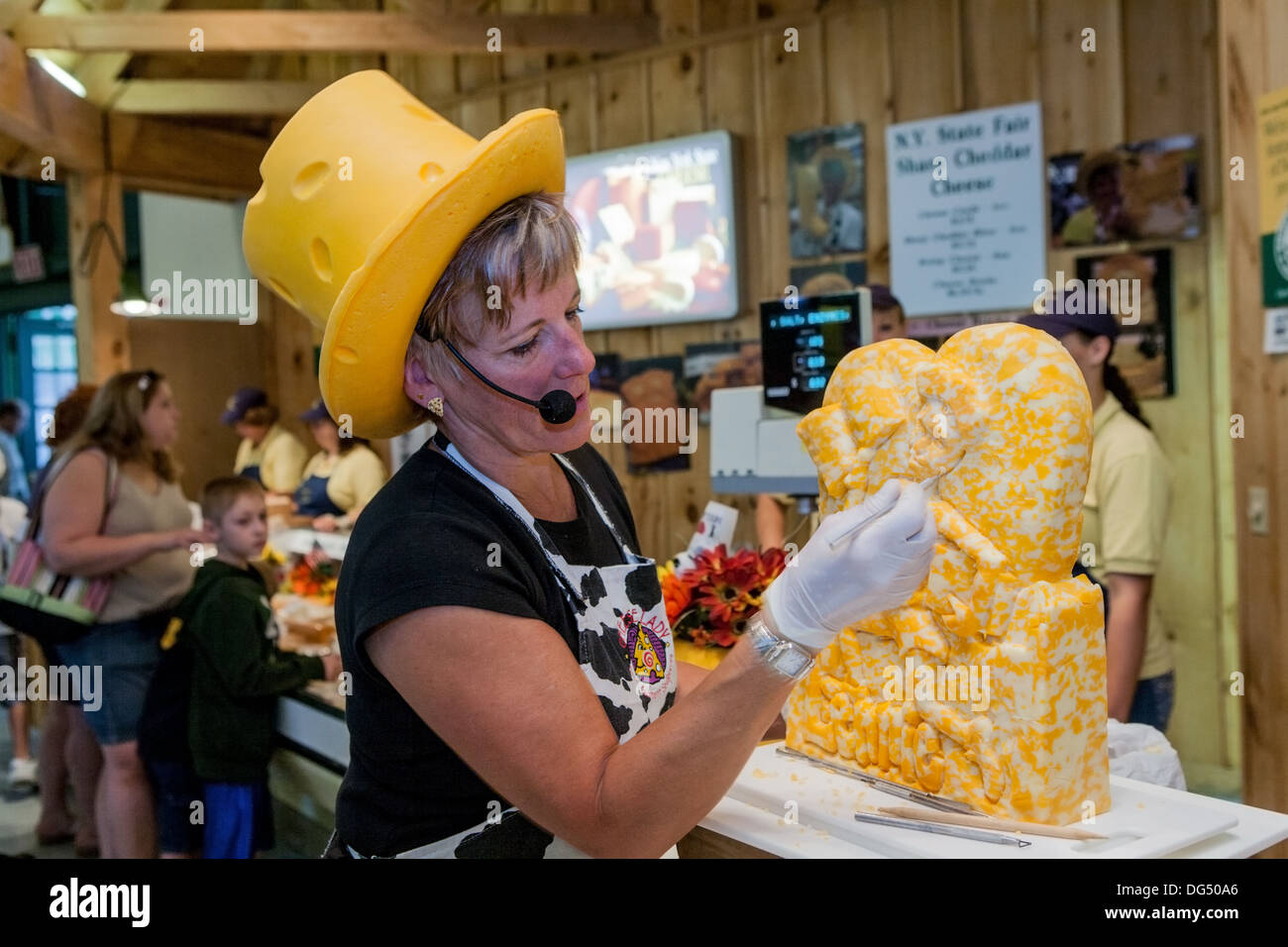 Woman carving cheese sculpture, Great New York State Fair, Syracuse ...