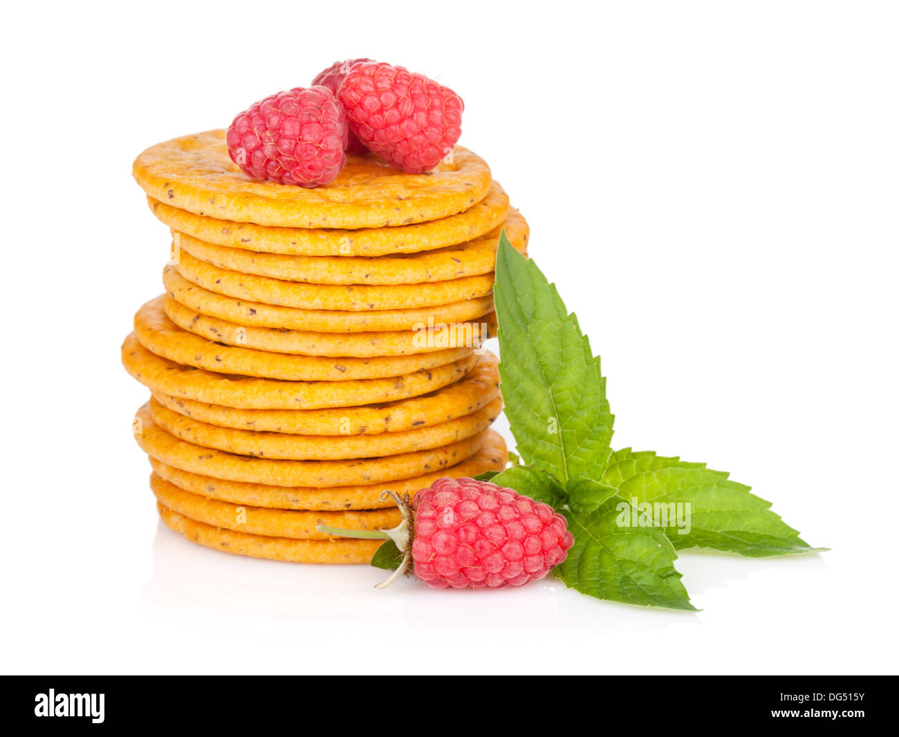 Stack of crackers with mint and berries. Isolated on white background ...