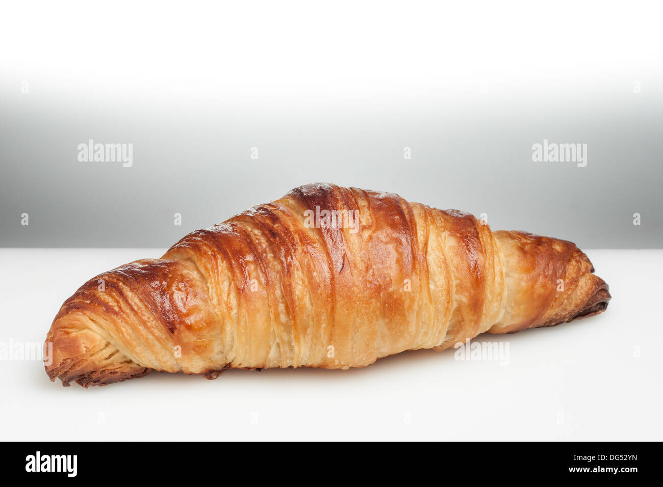 Butter croissant isolated on white Stock Photo - Alamy