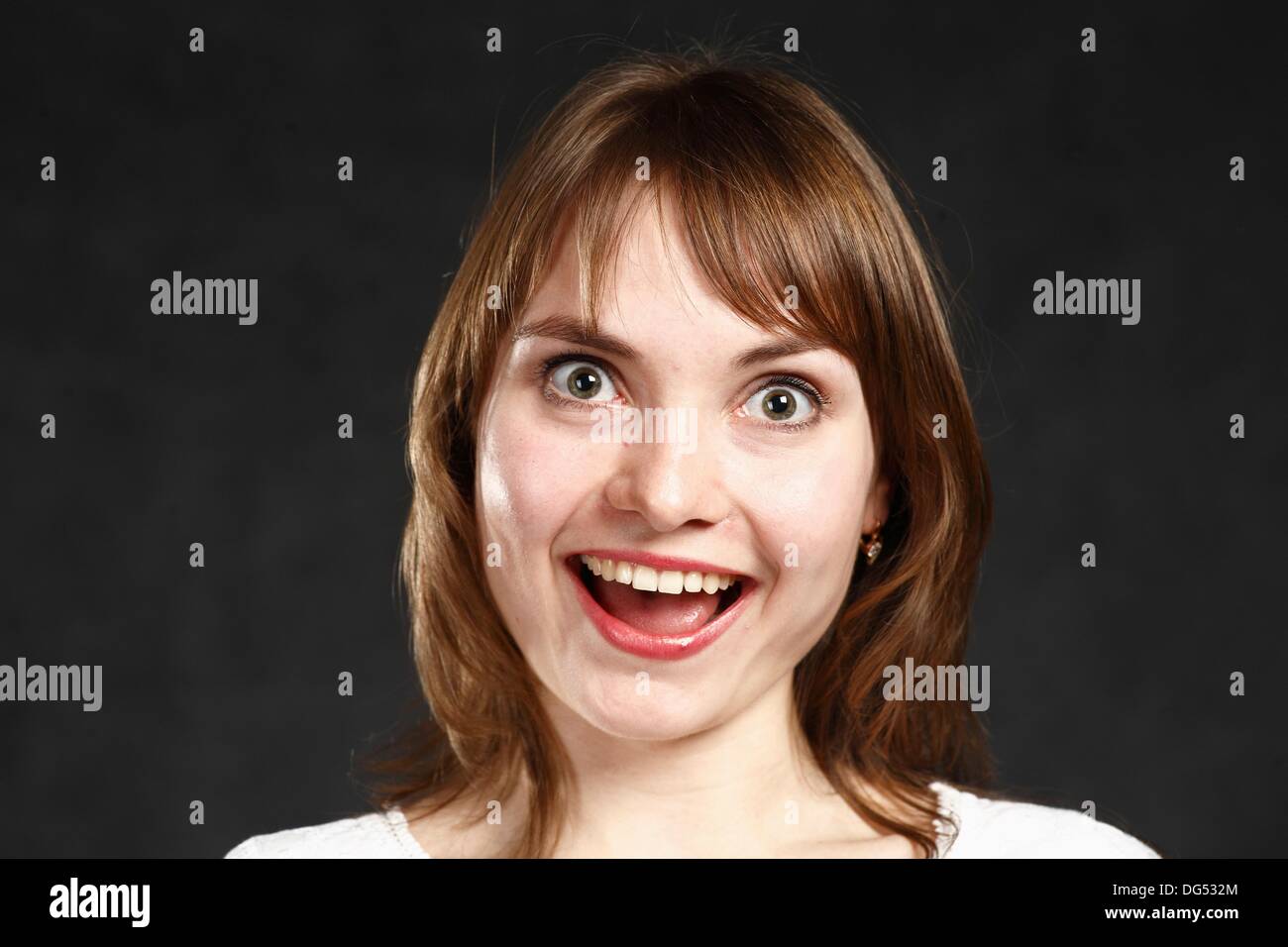 funny face expression beautiful young woman Stock Photo - Alamy