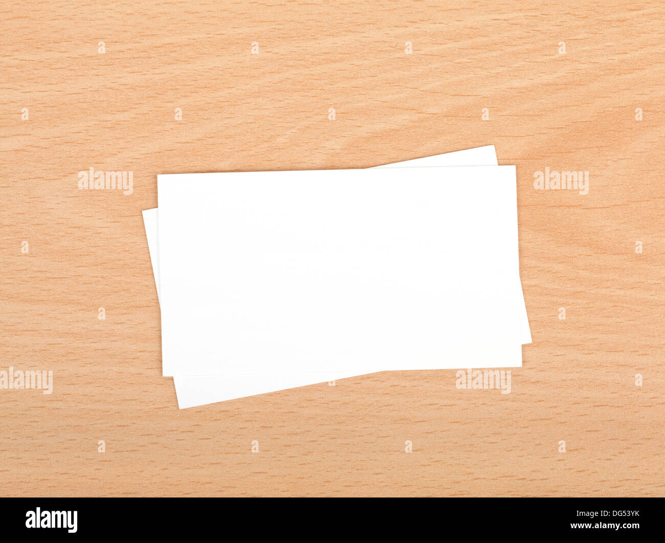 Blank business cards on wooden office table Stock Photo - Alamy
