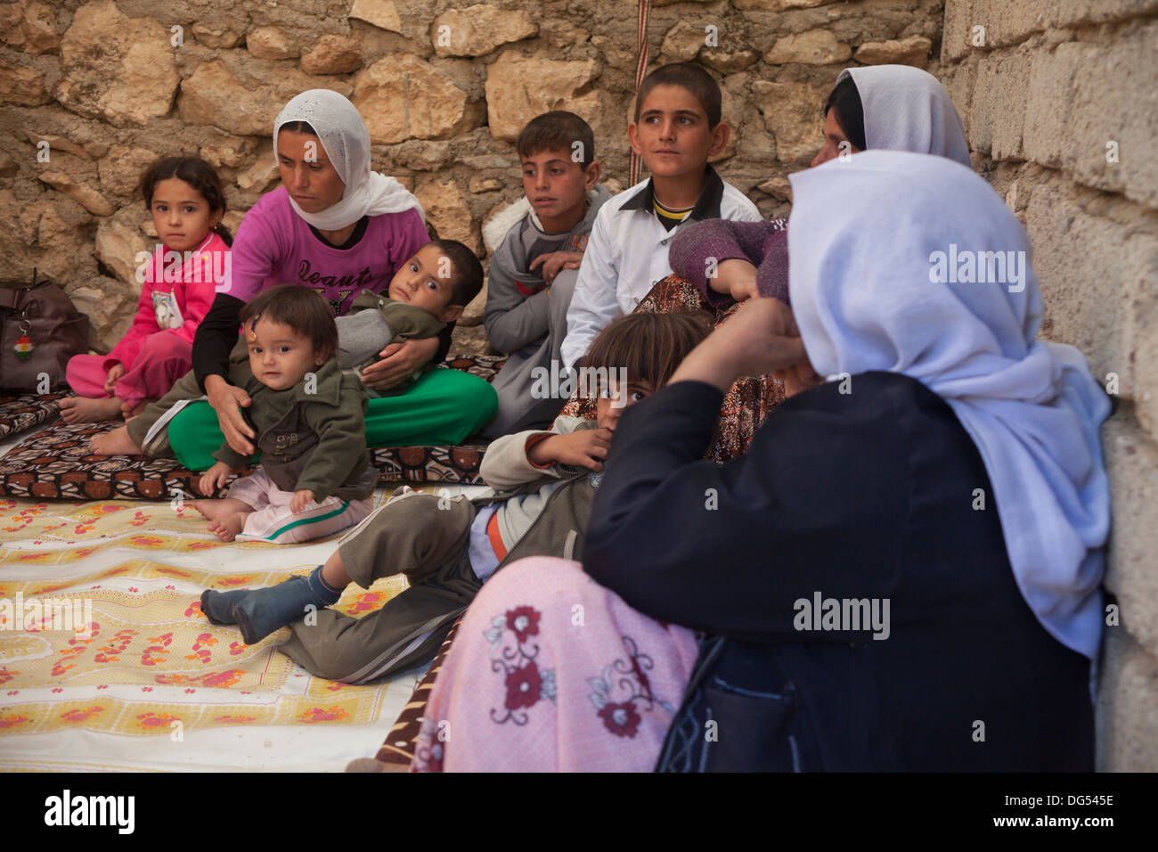 Family in prayer at home hi-res stock photography and images - Alamy