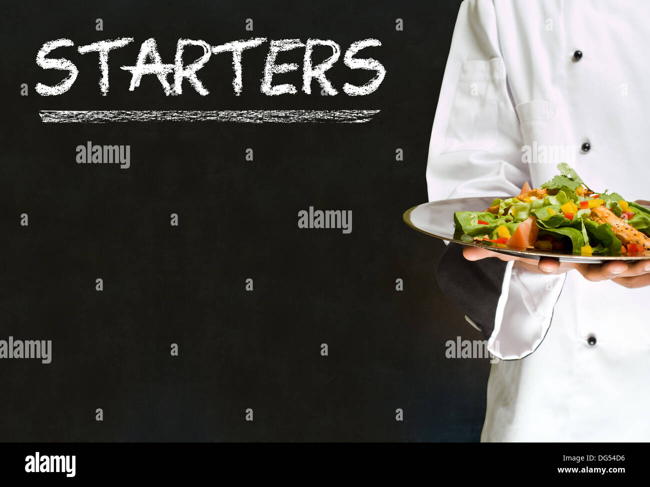 Chef with chalk starters sign written on blackboard background Stock ...
