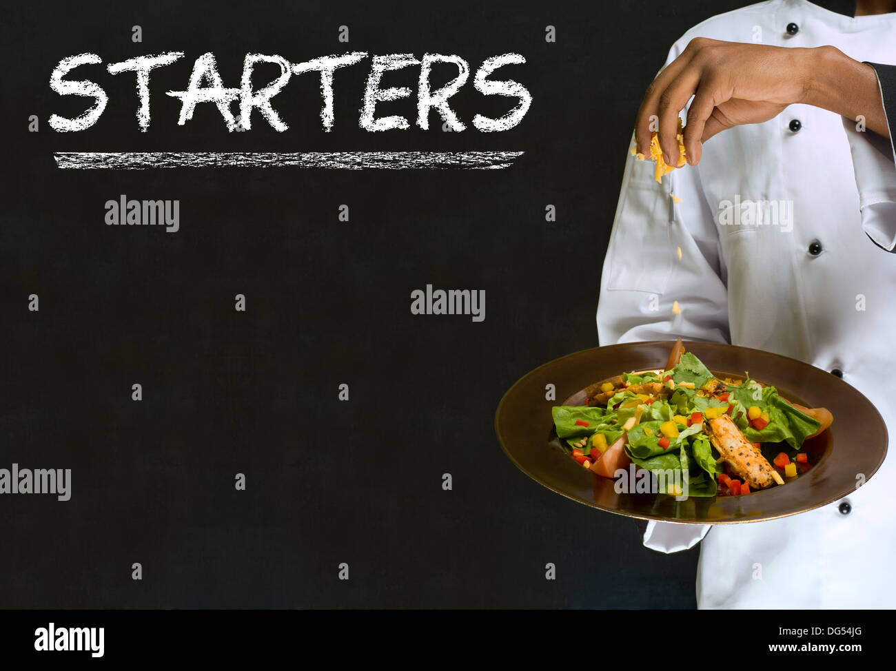 Chef with chalk starters sign written on blackboard background Stock ...