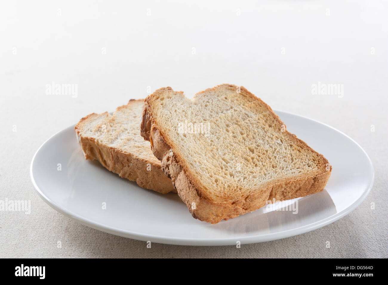 Plate with two golden toast Stock Photo - Alamy
