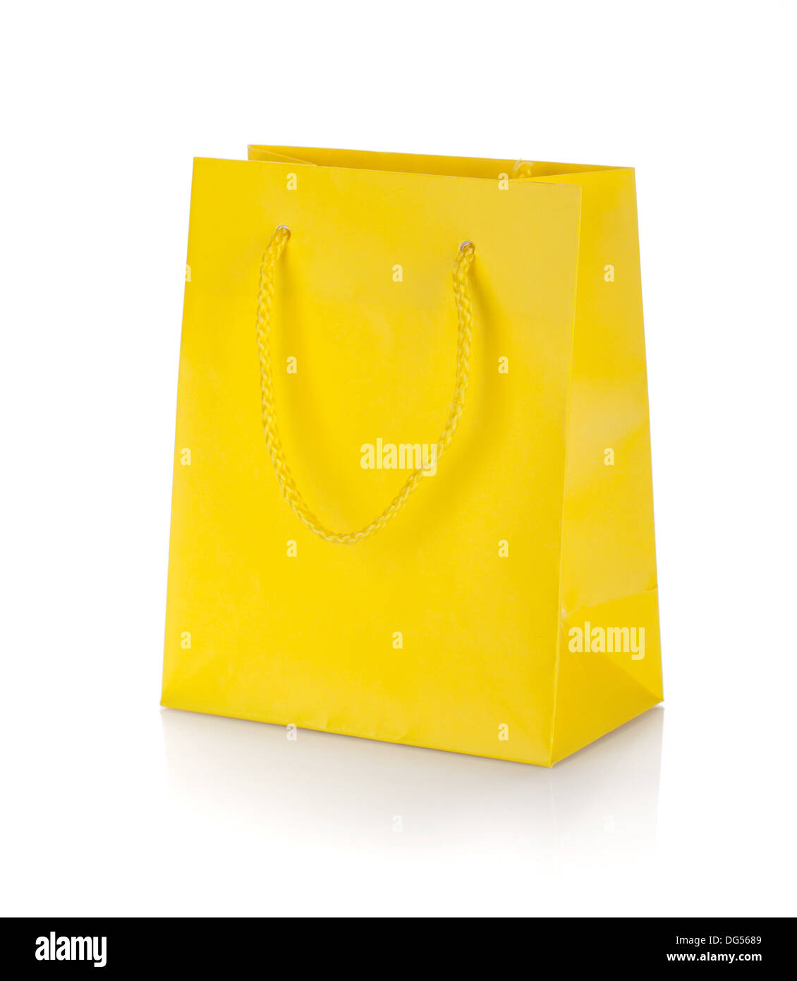 Yellow gift bag. Isolated on white background Stock Photo - Alamy