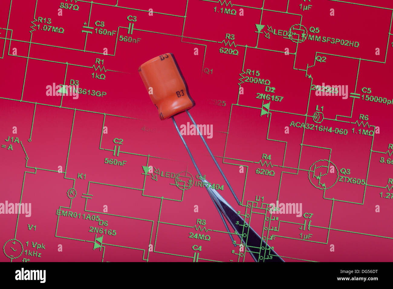 Detail of capacitor in red background Stock Photo - Alamy