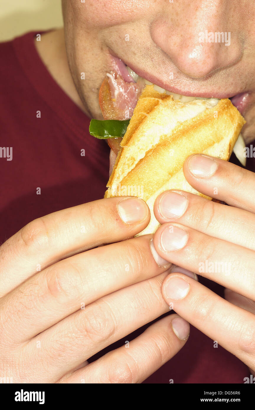 Bite off man hi-res stock photography and images - Alamy