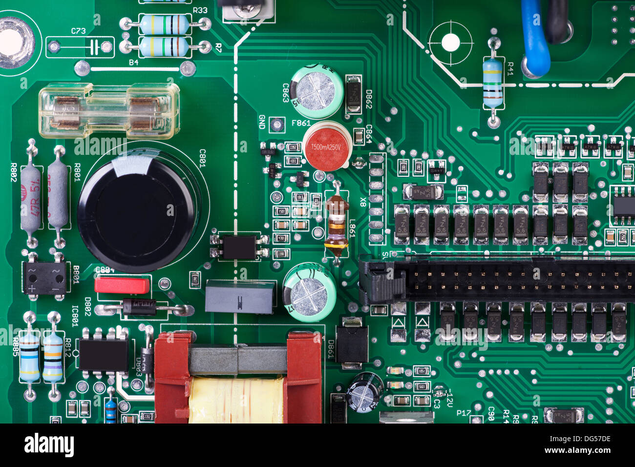 Circuit board with many conventional and SMD electronic components ...