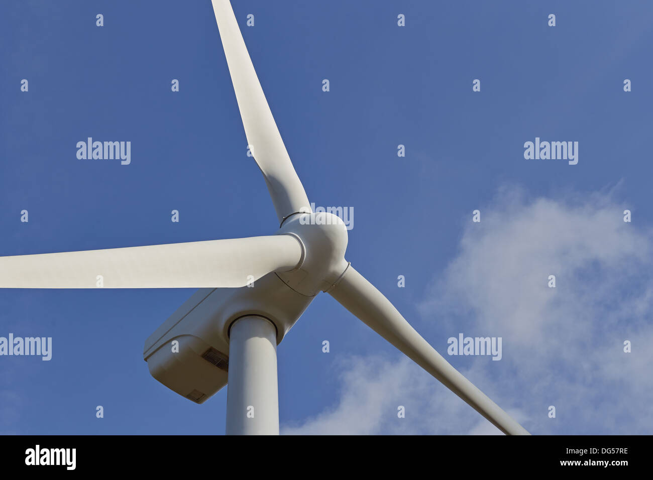 Single windmill for renewable electric energy production on blue sky ...