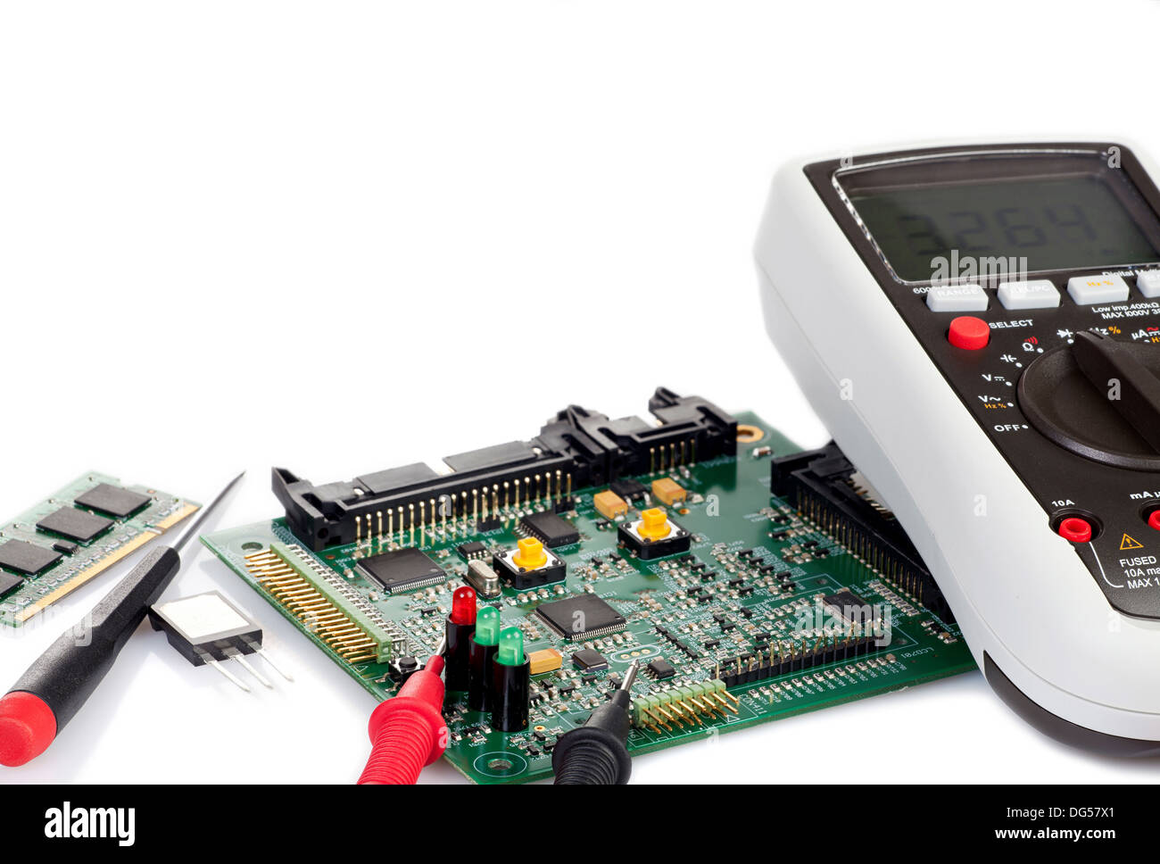 Digital multimeter is with a circuit board and electronic components ...
