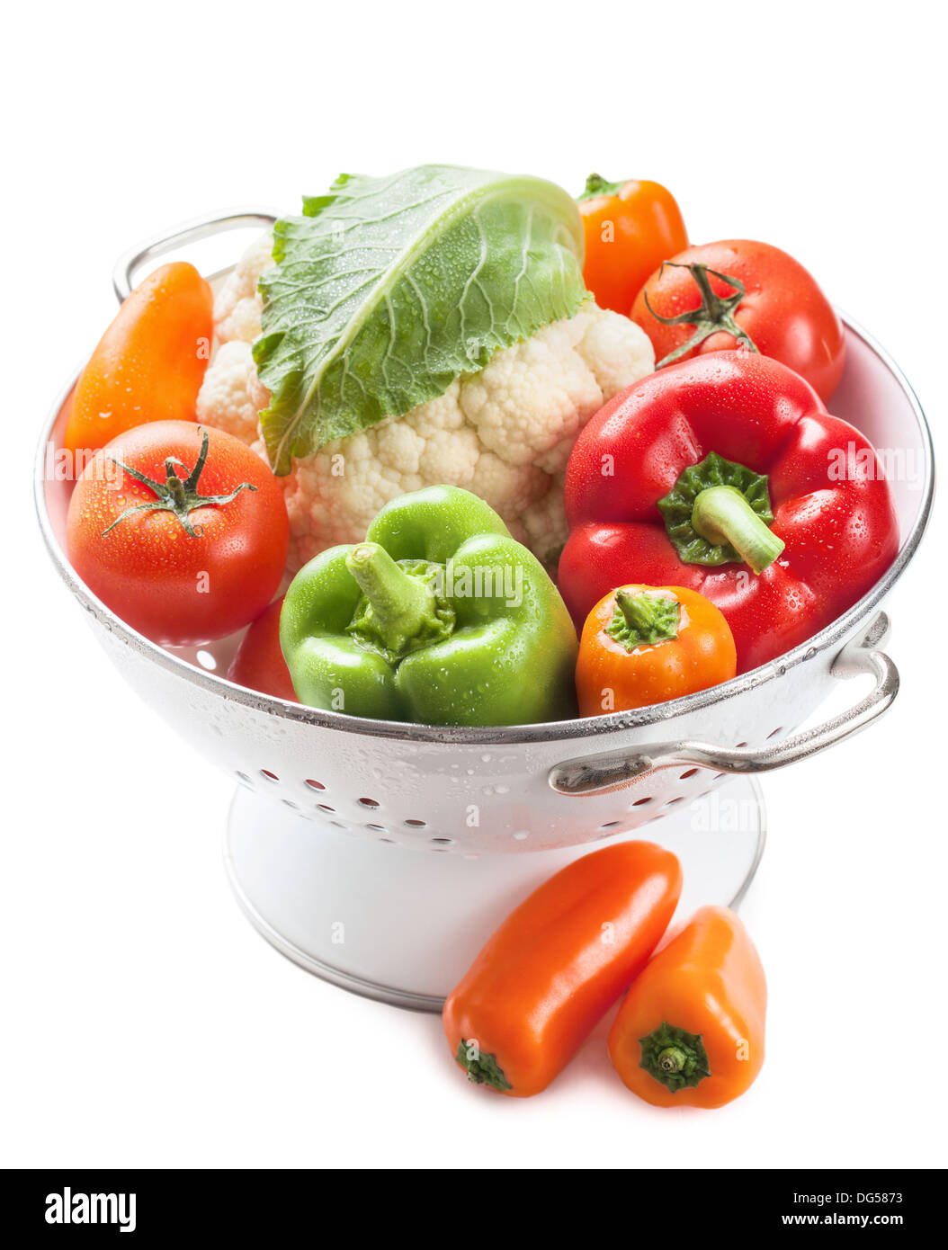 colorful vegetables in colander isolated Stock Photo - Alamy