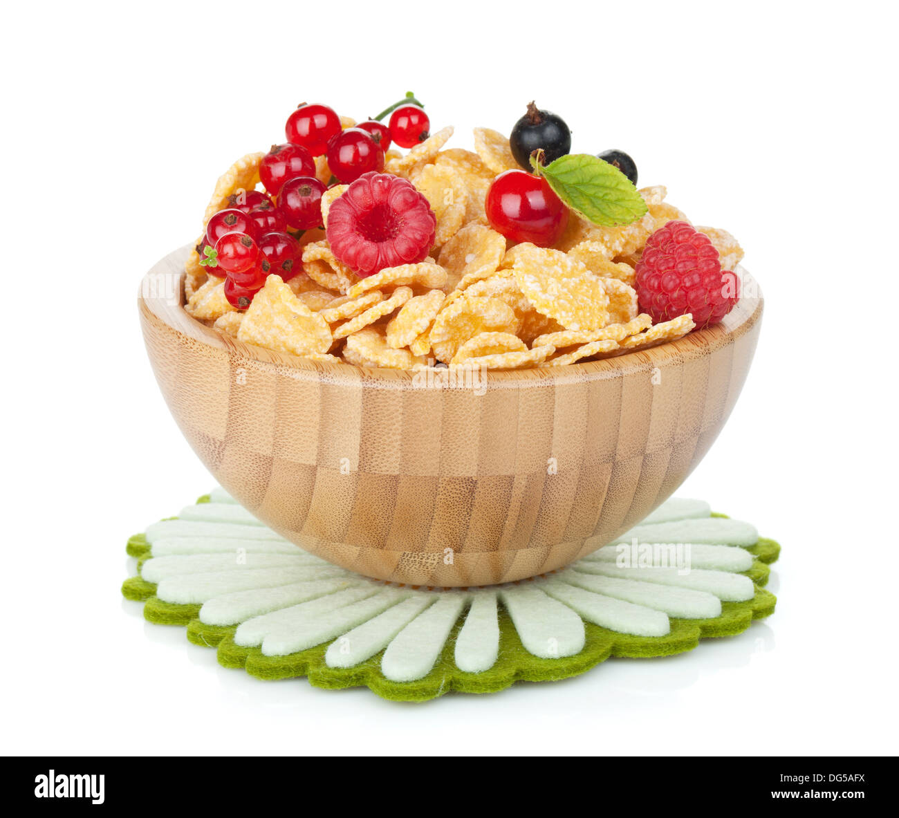 Fresh corn flakes with berries in bowl. Isolated on white background ...