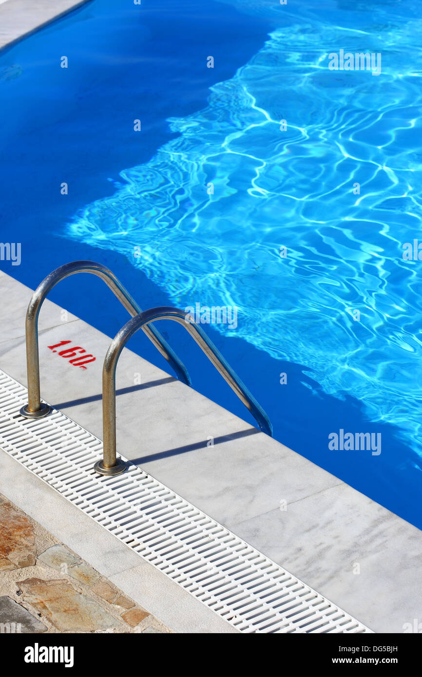 swimming pool with crystal clear blue water Stock Photo - Alamy