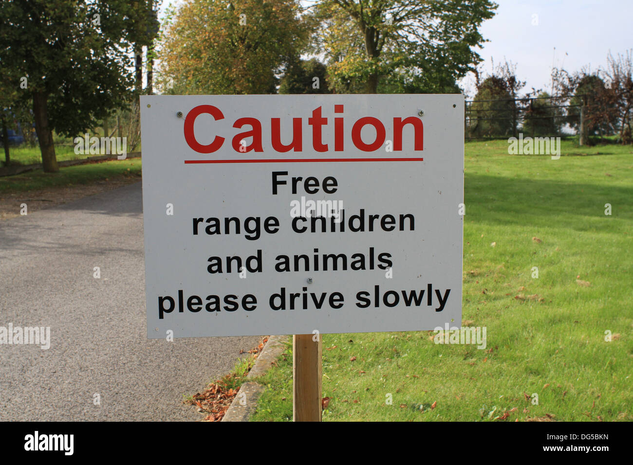 Caution free range children and animals Please drive slowly Stock Photo ...