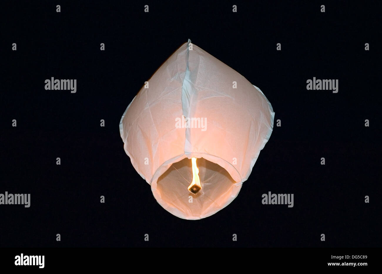 White fire balloon on the dark night background Stock Photo - Alamy