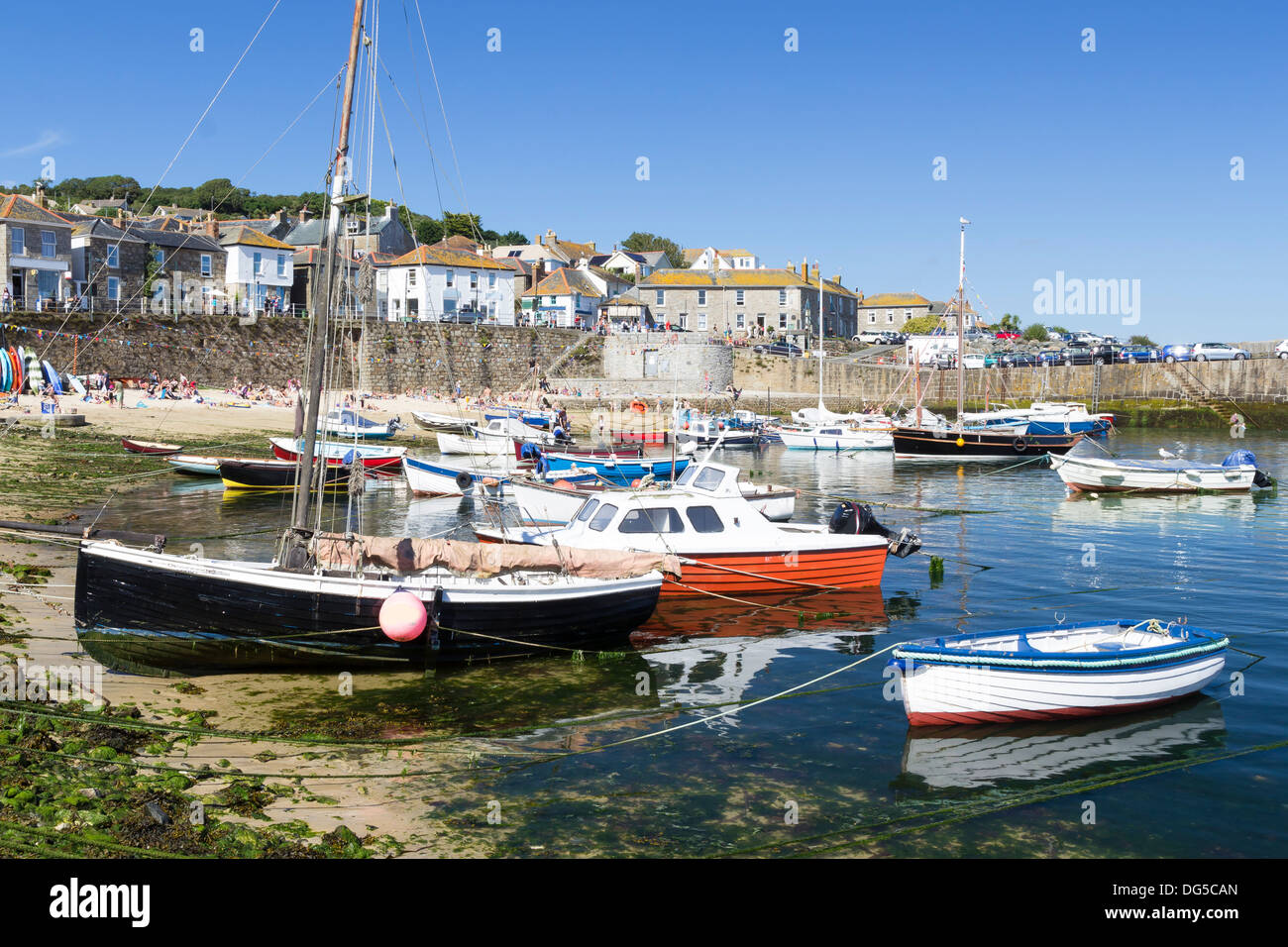 Summer at the historic fishing harbour Mousehole Cornwall England UK ...