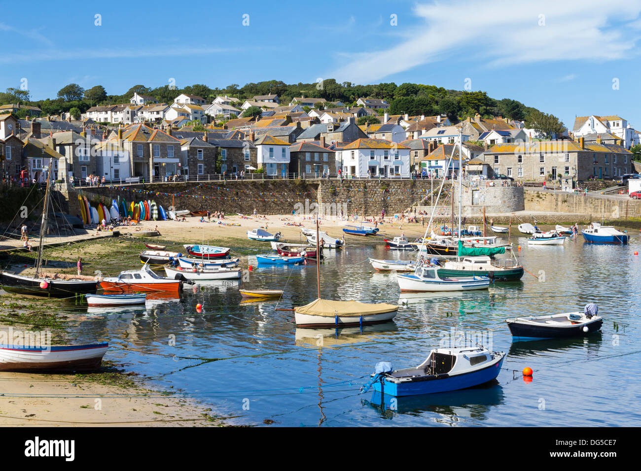 Summer at the historic fishing harbour Mousehole Cornwall England UK ...