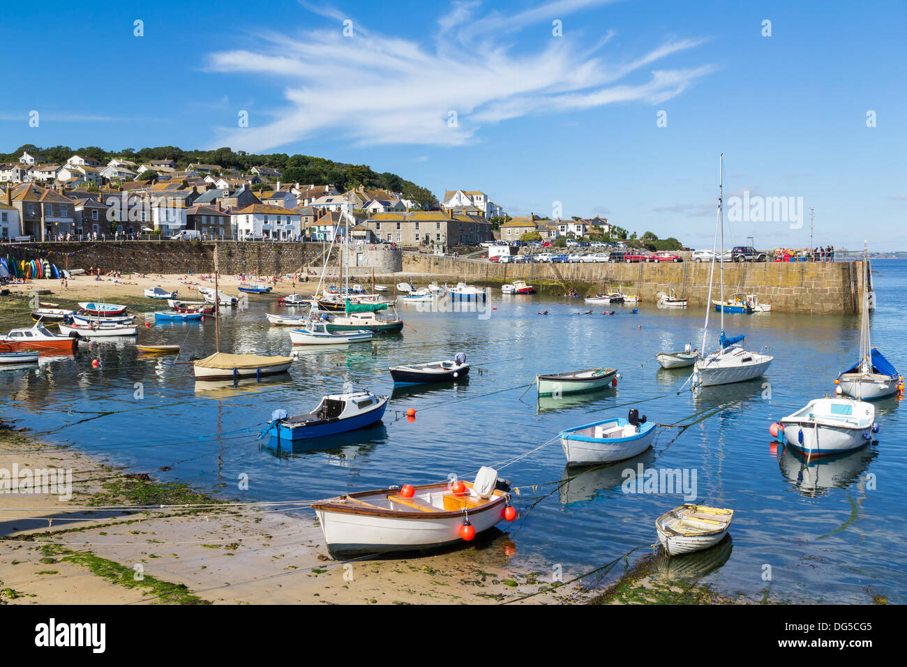 Summer at the historic fishing harbour Mousehole Cornwall England UK ...