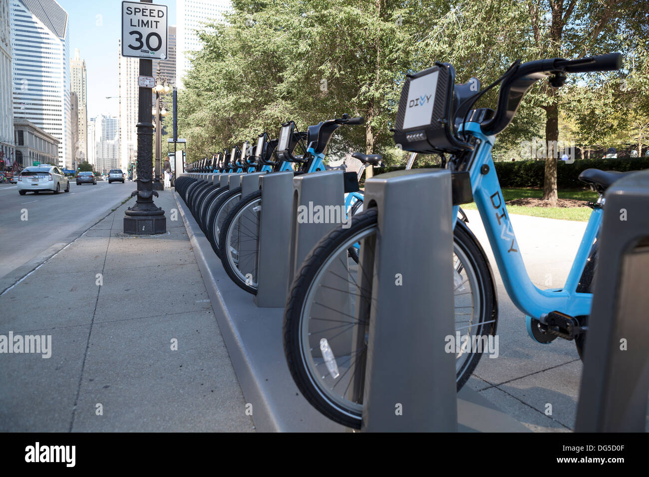A row of blue Divvy bikes available for users to ride in downtown ...