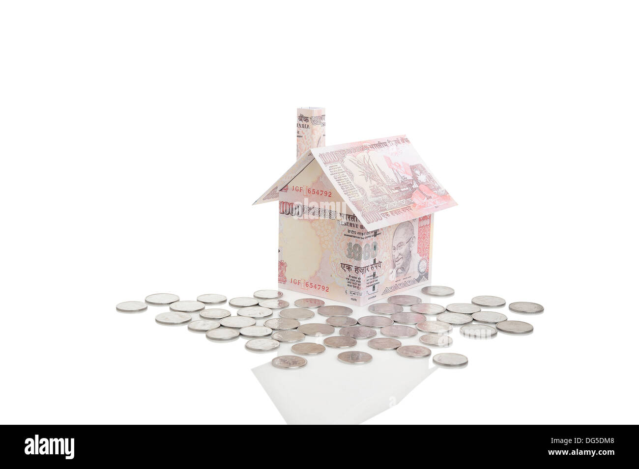 House made out of Thousand Rupee (Indian Currency) denomination. Coins ...