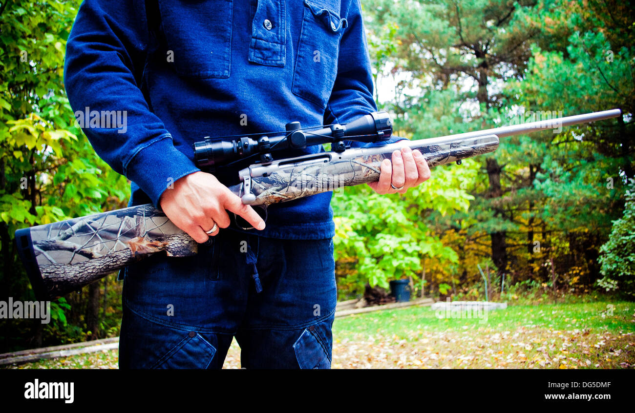 Holding a sniper rifle hi-res stock photography and images - Alamy