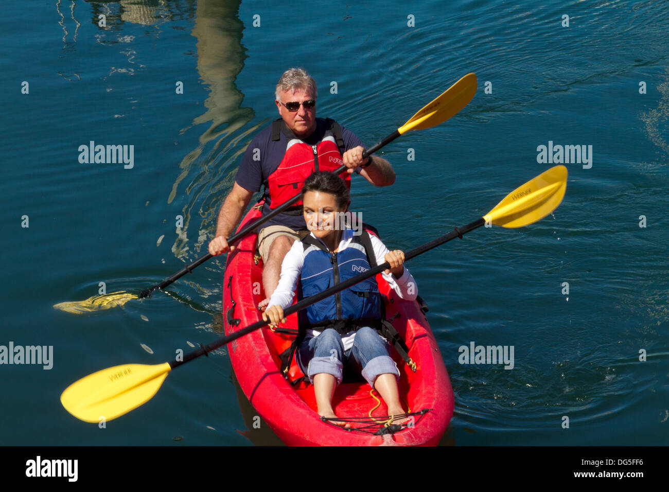 Couple kayaking in Santa Barbara harbor Stock Photo - Alamy