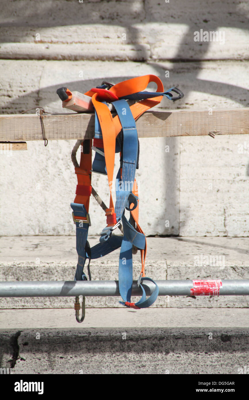 builder safety harness on scaffolding on building construction site ...
