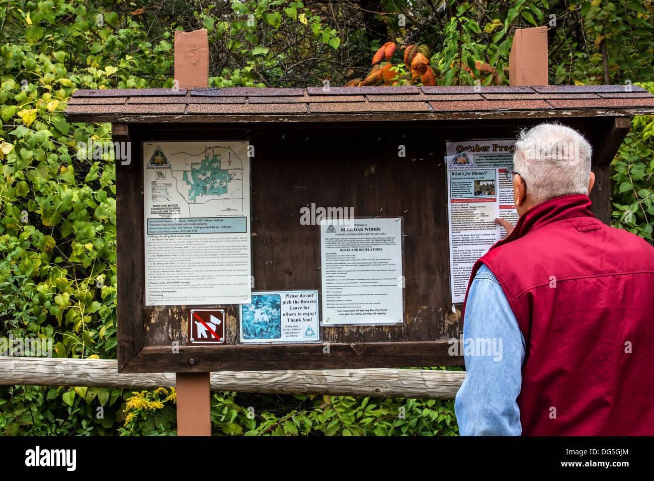Man Observing the posted rules Stock Photo - Alamy