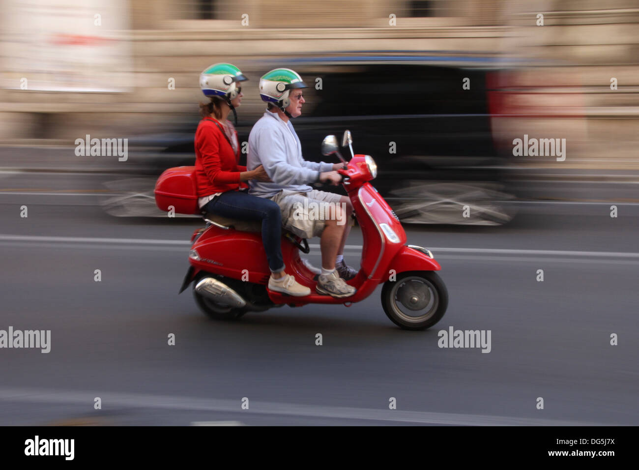 Woman italian on moped hi-res stock photography and images - Alamy
