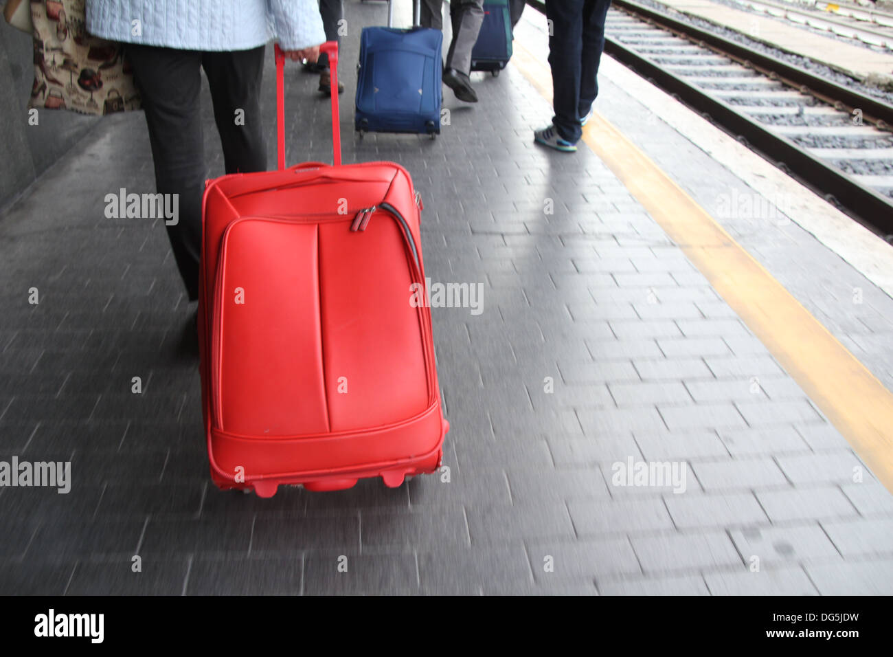 Passenger train suitcase pulling platform hi-res stock photography and ...